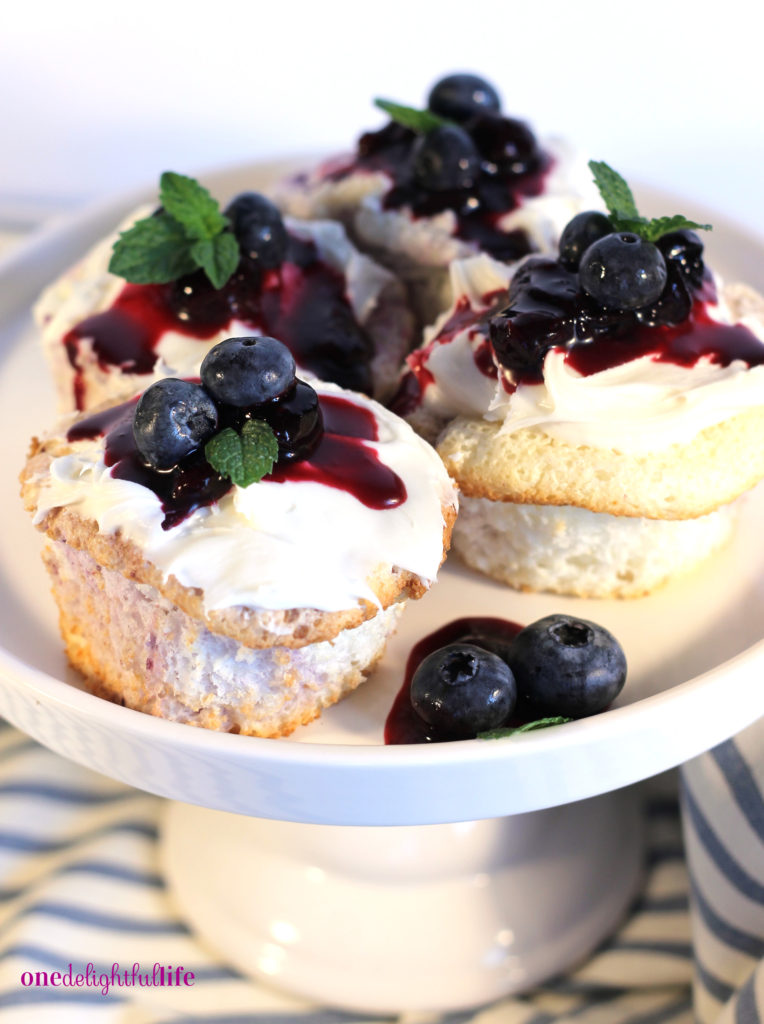 Angel Food Cupcakes with Vanilla Blueberry Sauce - One Delightful Life